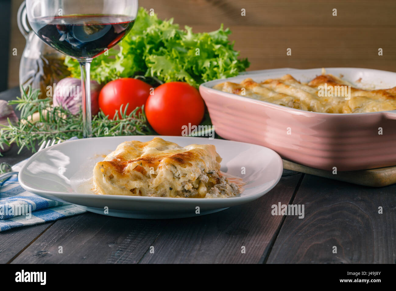 Potion of lasagne on plate. mediterranean dinned concept Stock Photo ...