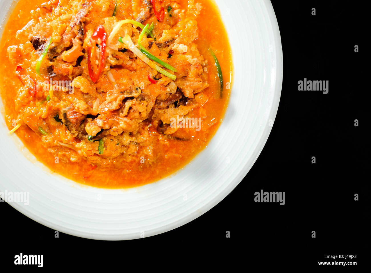 Seafood with Yellow curry sauce, sauteed seafood contains fish, shrimp ...