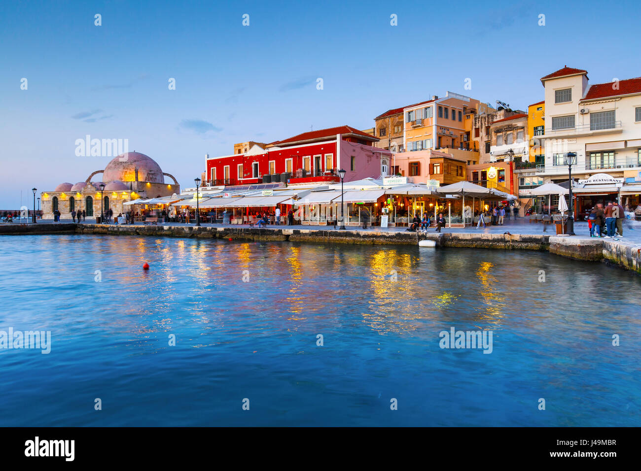Old Venetian harbor of Chania town on Crete island, Greece Stock Photo ...
