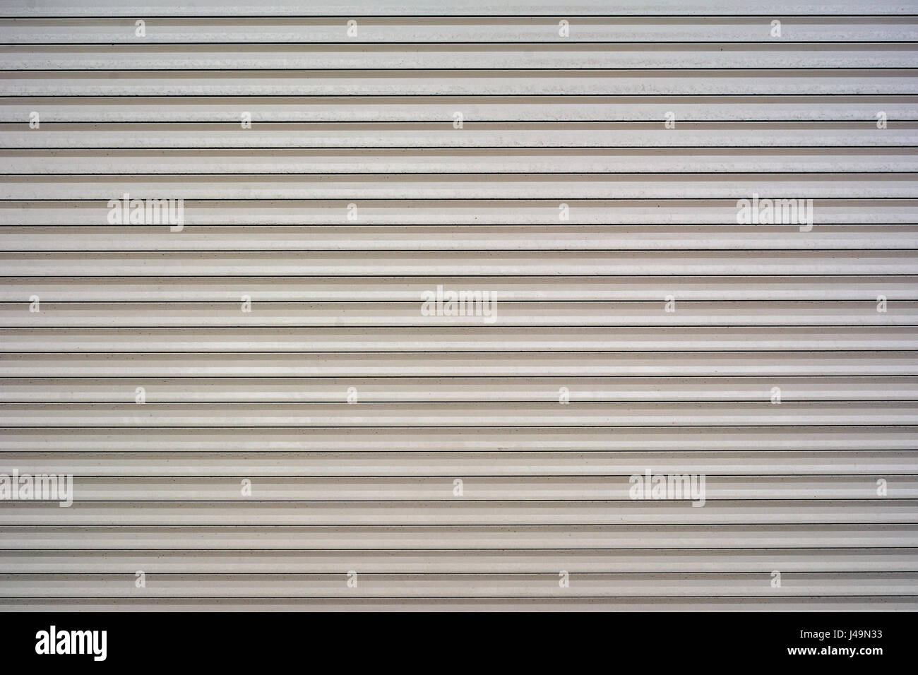 White metal roller door shutter background and texture Stock Photo - Alamy
