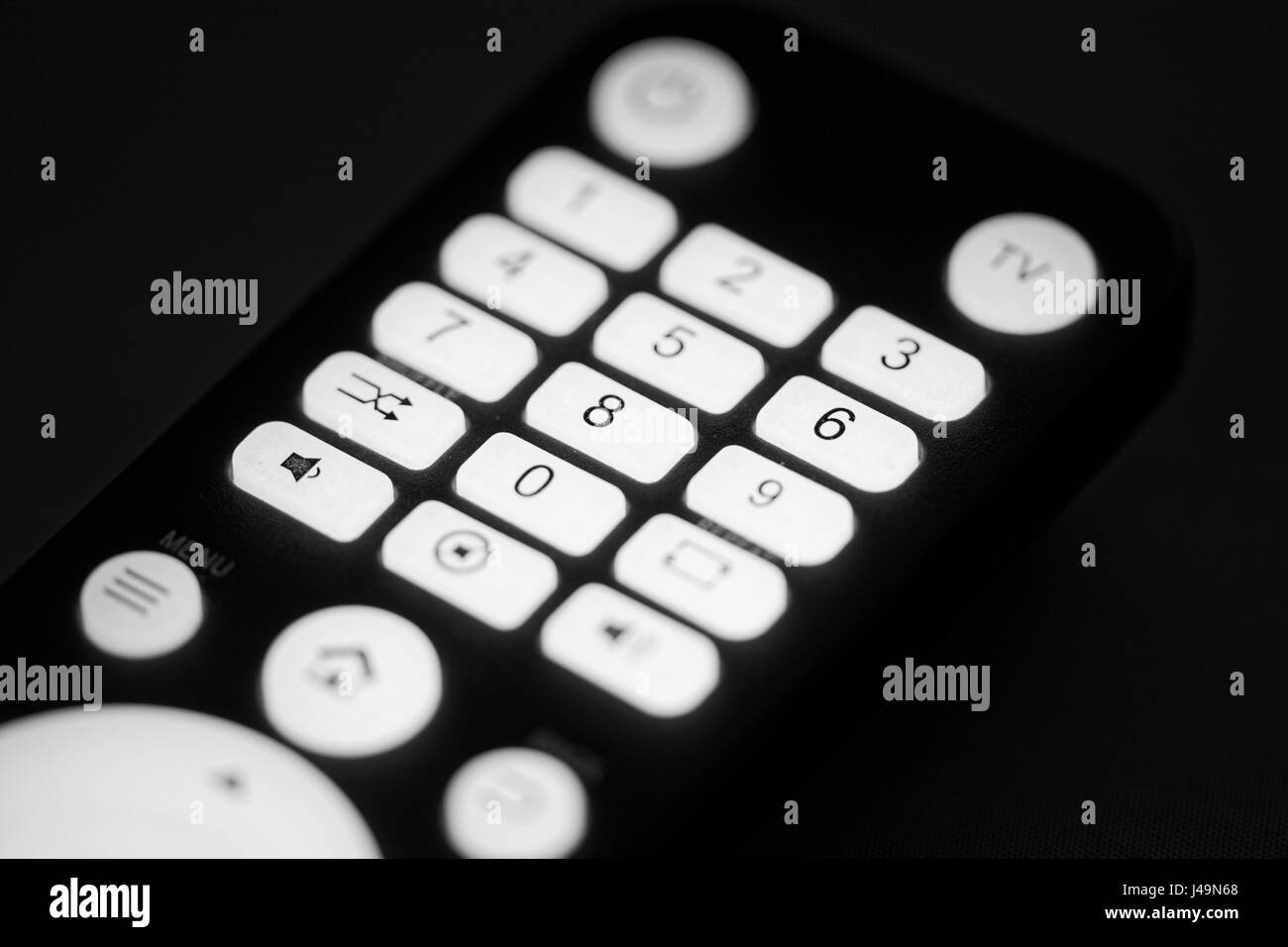 remote control with backlight in monochrome Stock Photo - Alamy