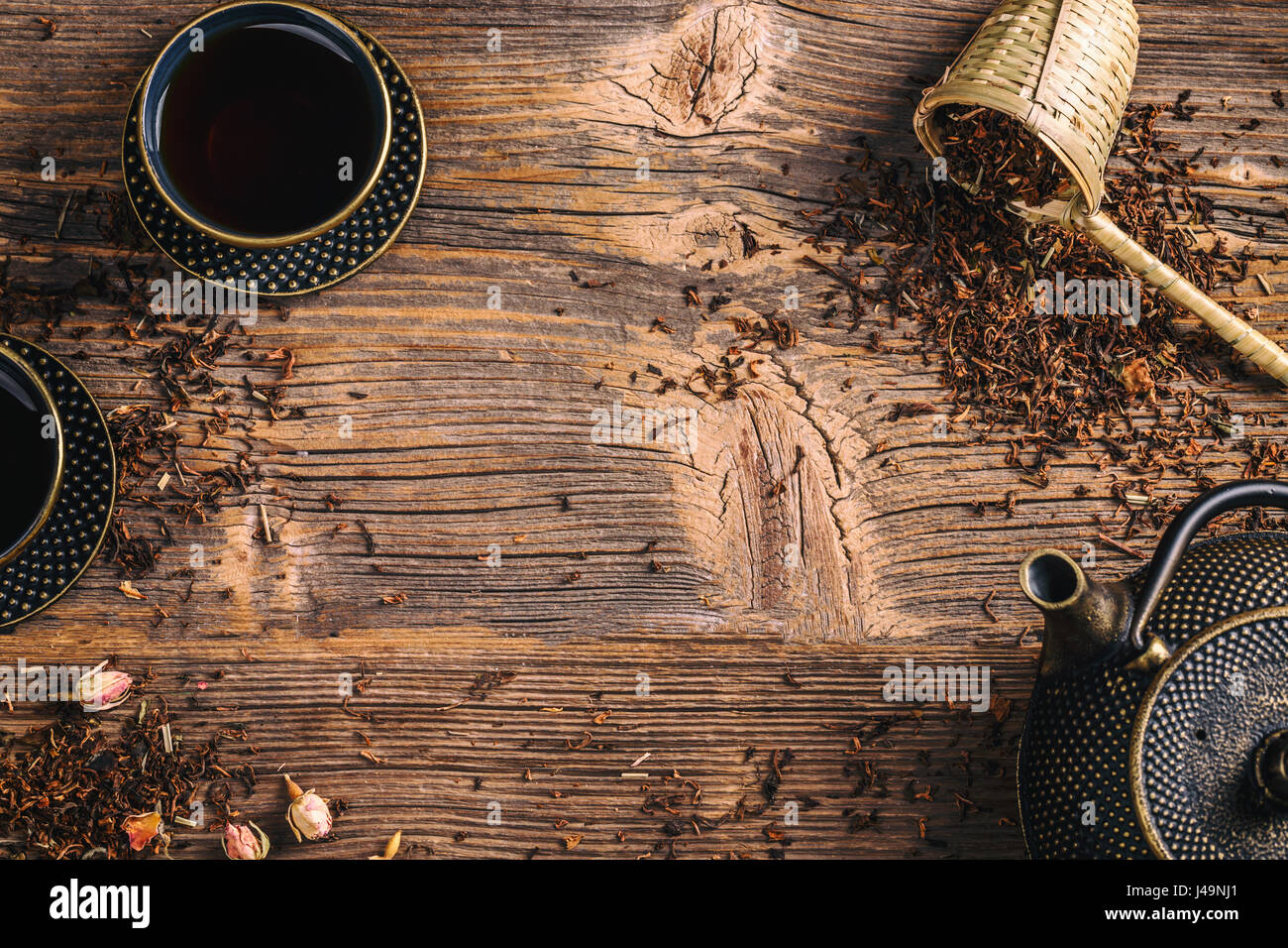 Top view of iron asian style teapot and tea cups, copy space Stock Photo - Alamy