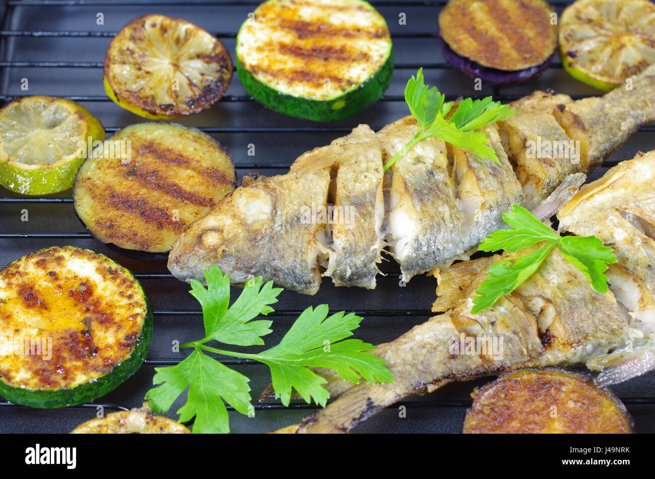 Trout fish fried on grill hi-res stock photography and images - Alamy