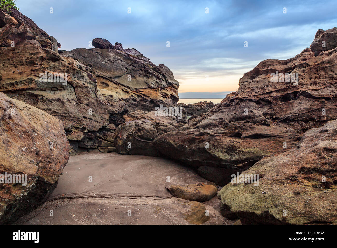 Beautiful sandstone rock at beach Stock Photo - Alamy