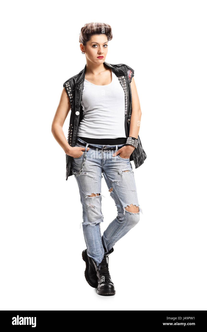 Full length portrait of a punk girl looking at the camera isolated on ...