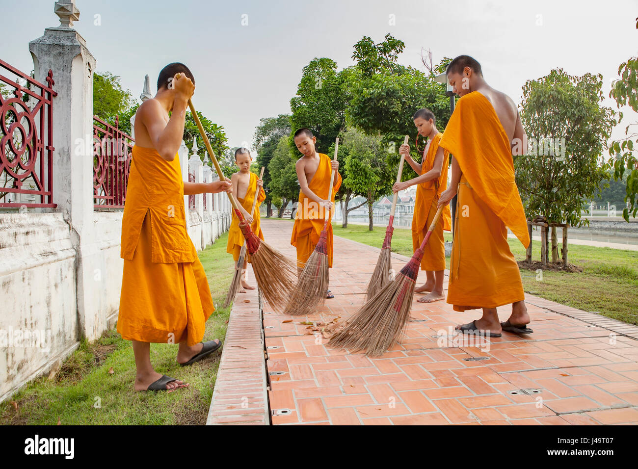 AYUTHAYA THAILAND : MARCH 28 : thai little buddhist monk daily cleaning ...