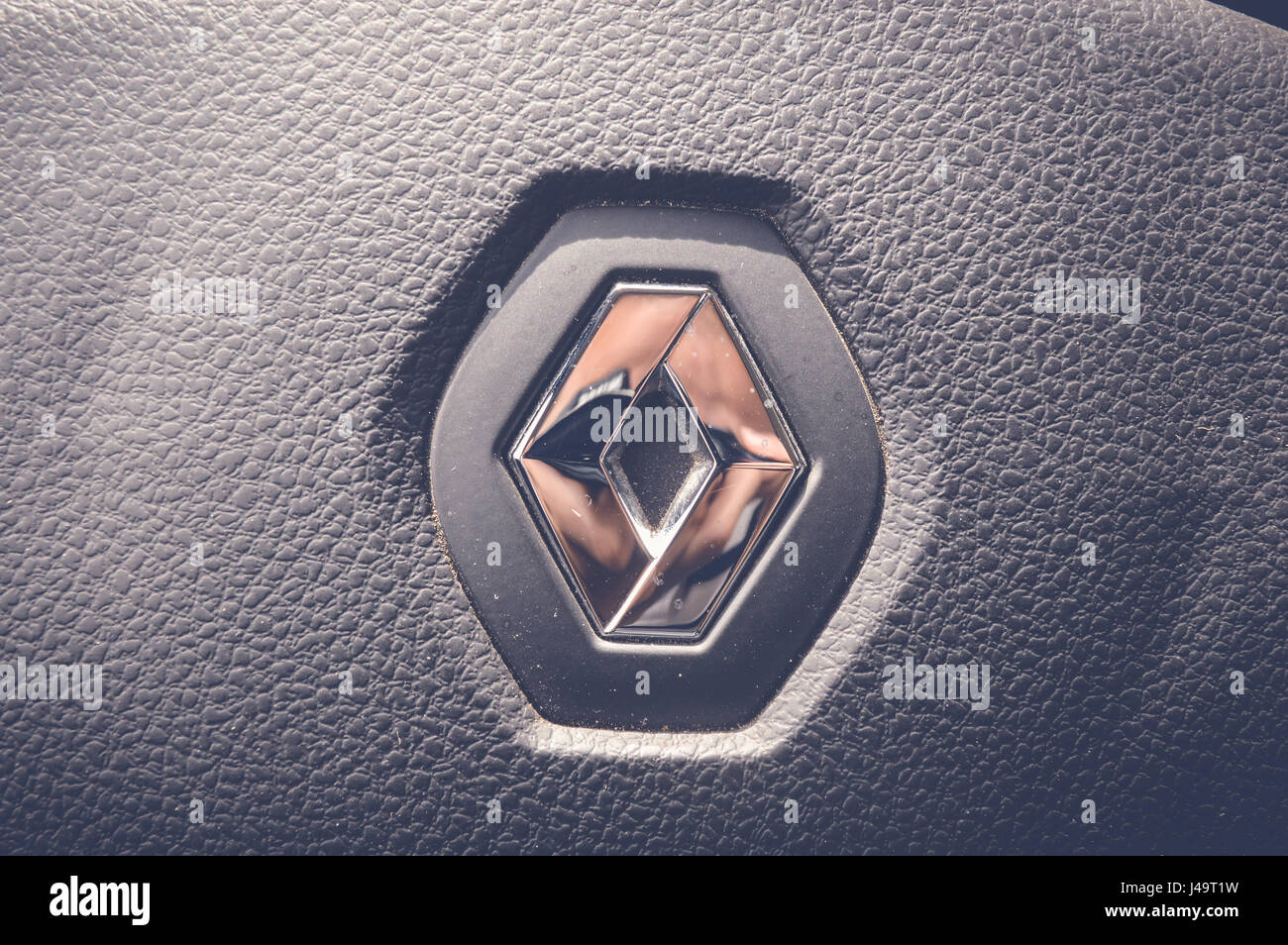 cairo, egypt, may 6, 2017: closeup of renault logo on Steering wheel ...