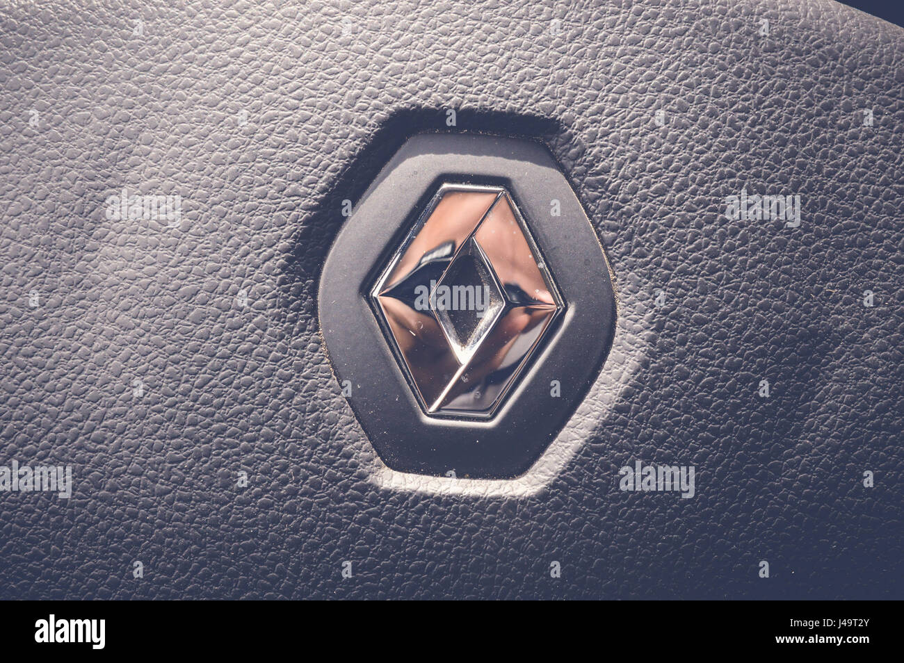 cairo, egypt, may 6, 2017: closeup of renault logo on Steering wheel ...