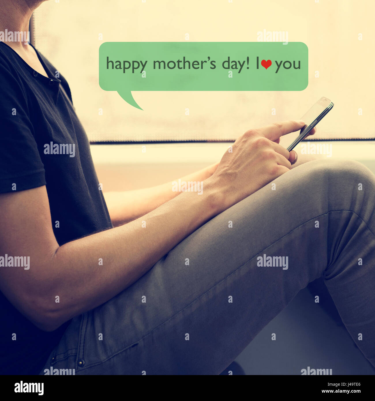 Young happy man texting message hi-res stock photography and images - Alamy