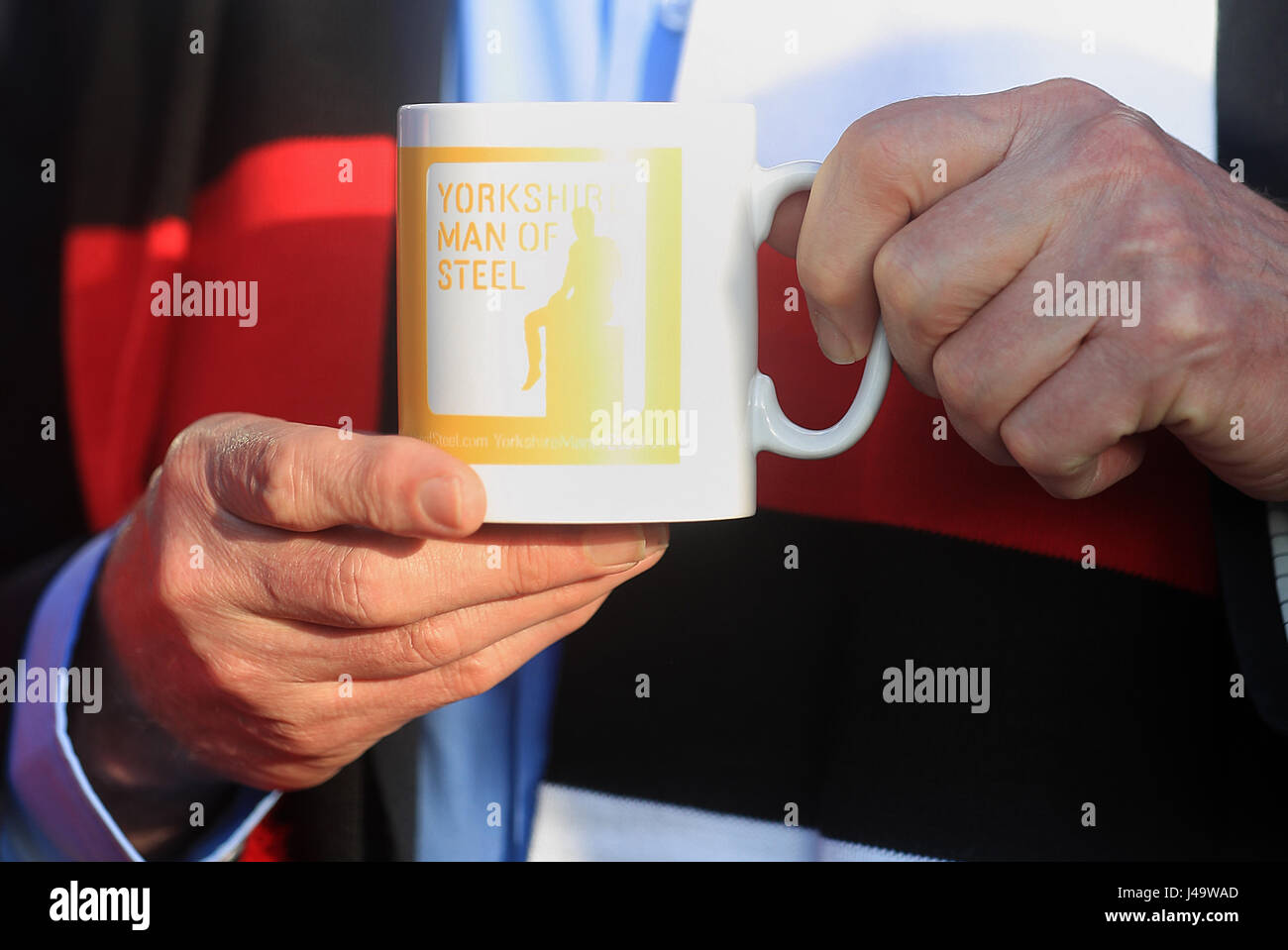 Labour leader Jeremy Corbyn wears a Rotherham United scarf after making ...