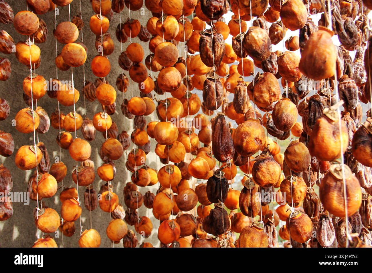 Dried persimmons hi-res stock photography and images - Alamy