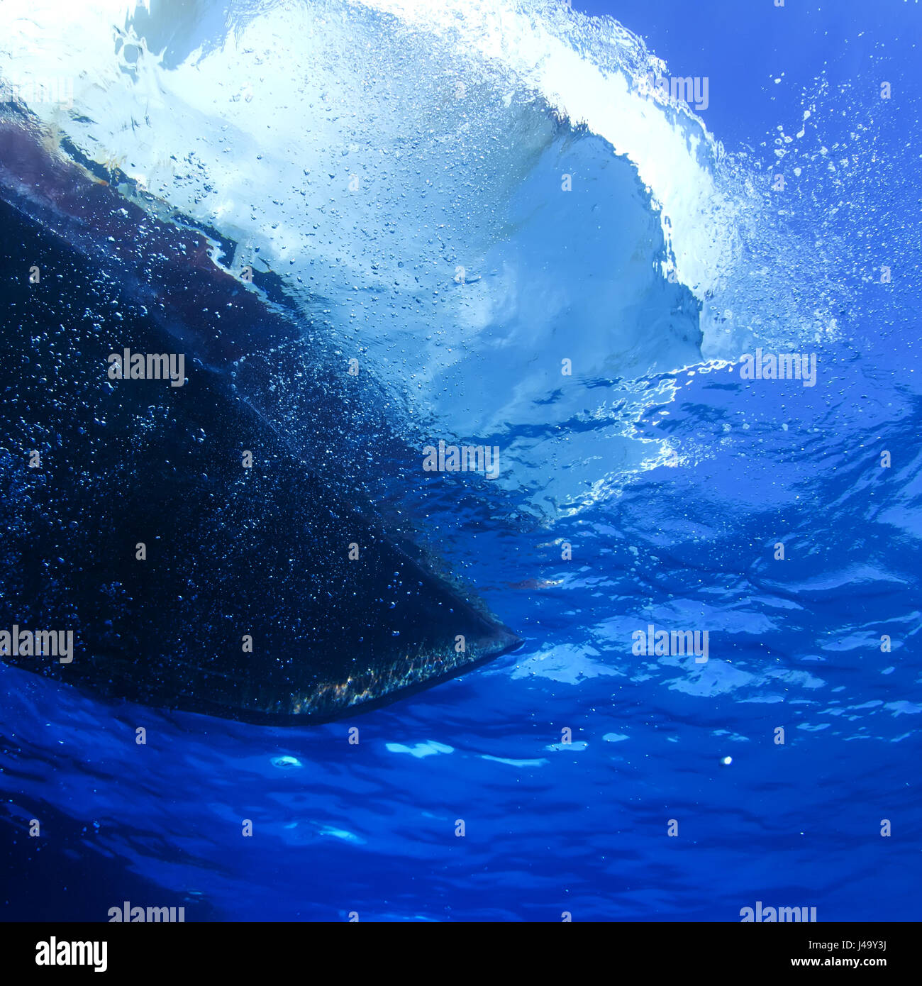 Underwater design pattern. Dive boat floating on water surface shooted ...