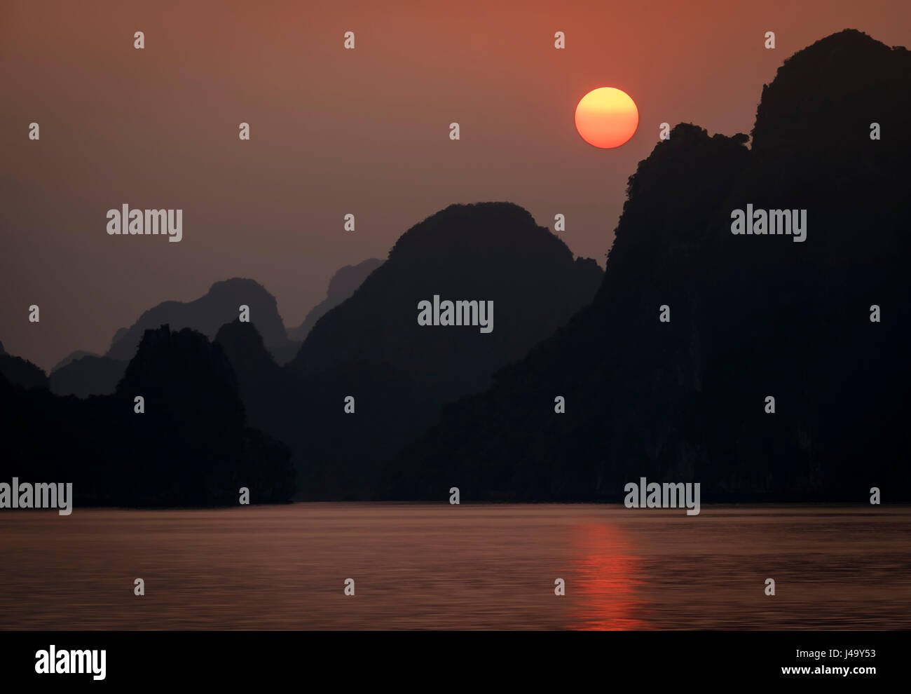 HA LONG BAY, VIETNAM - CIRCA SEPTEMBER 2014: Sunset in Halong Bay ...