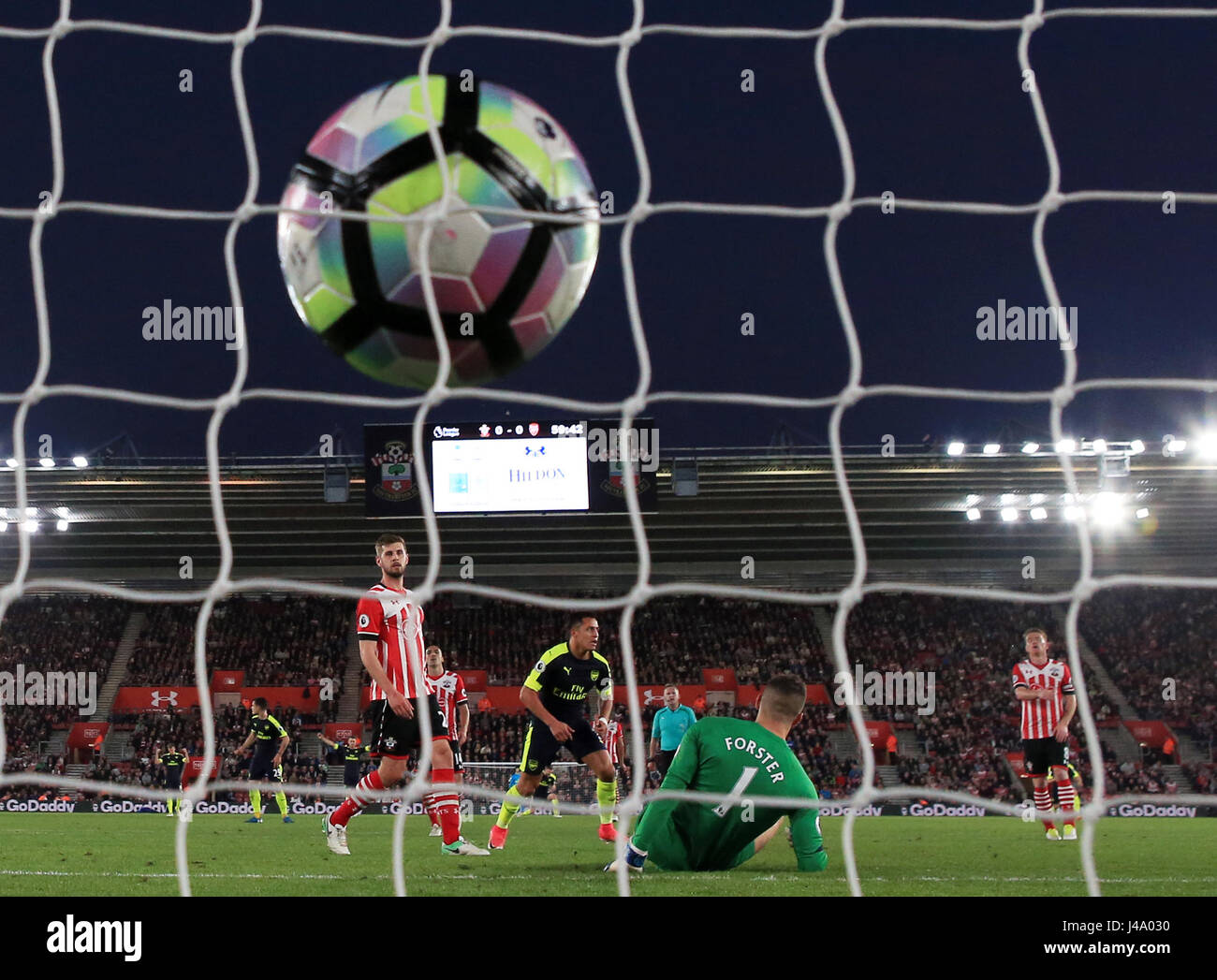 Arsenal's Alexis Sanchez scores his side's first goal of the game ...