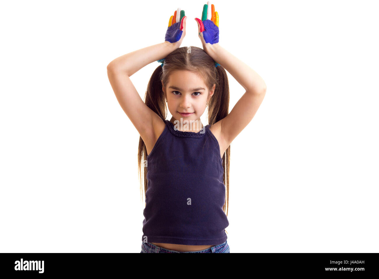Little girl with colored hands Stock Photo - Alamy