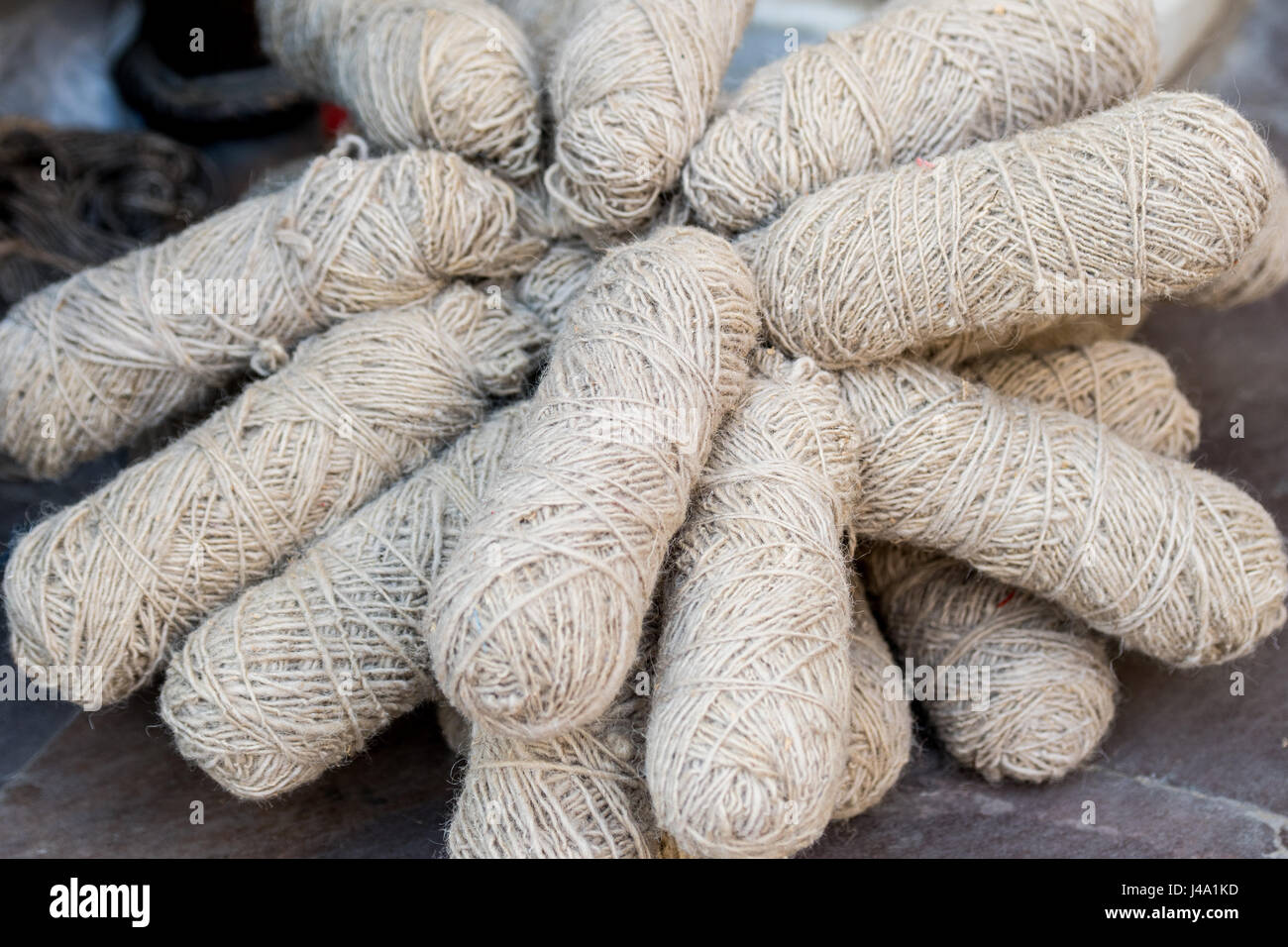 Jaipur, India - Pile of thread for oriental rugs Stock Photo - Alamy