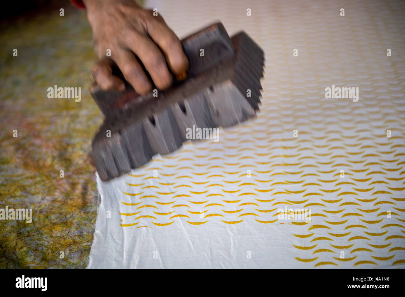 Jaipur, India - Indian man stamping pattern Stock Photo - Alamy