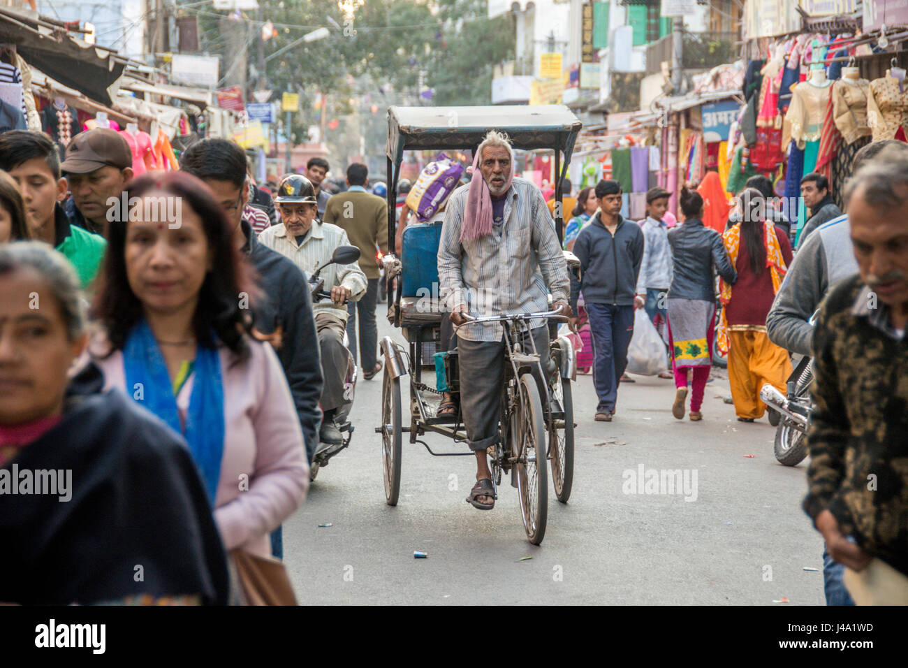 Johri Bazaar; Man driving rickshaw on busy street in Jaipur, India ...