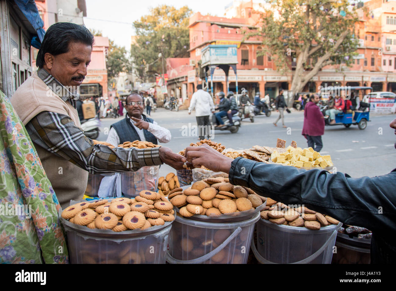 Johri Bazaar; Indian man selling cookies in market in Jaipur, India ...