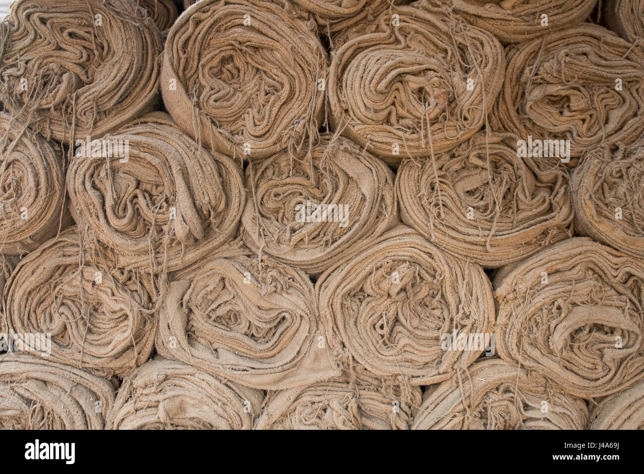 Burlap material is rolled and stored in a farming facility in New Delhi ...