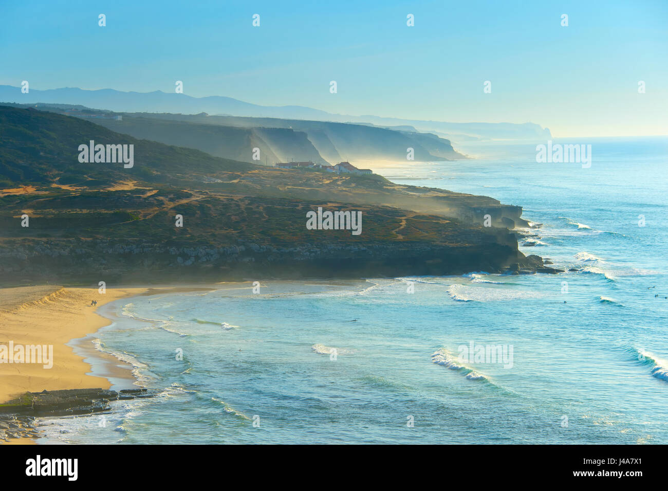 View of beautiful Portugal ocean shore at sunset Stock Photo - Alamy