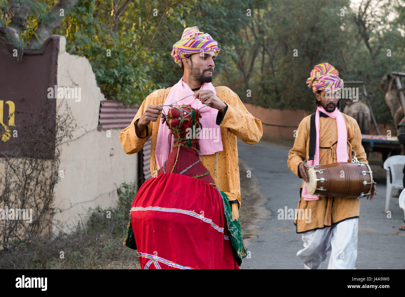 Indian men dancing hi-res stock photography and images - Alamy