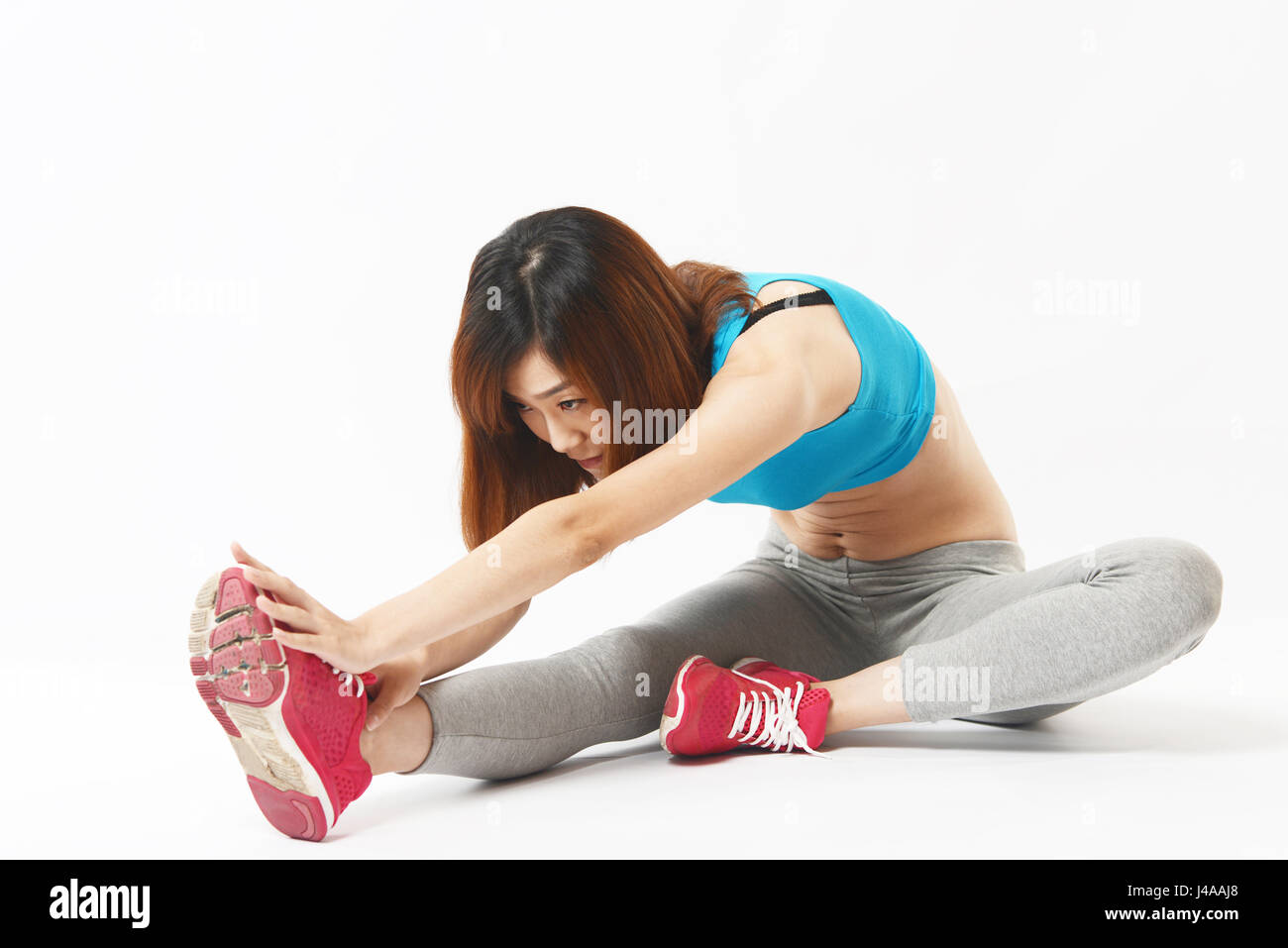 Women do fitness isolated on a white background Stock Photo - Alamy