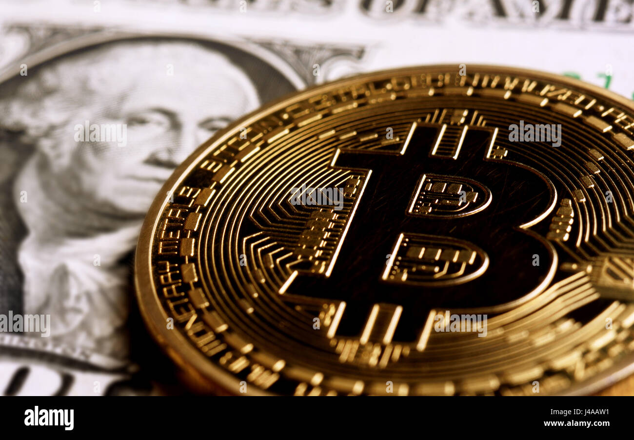 Bitcoin on one dollar banknote. Trading concept Stock Photo - Alamy