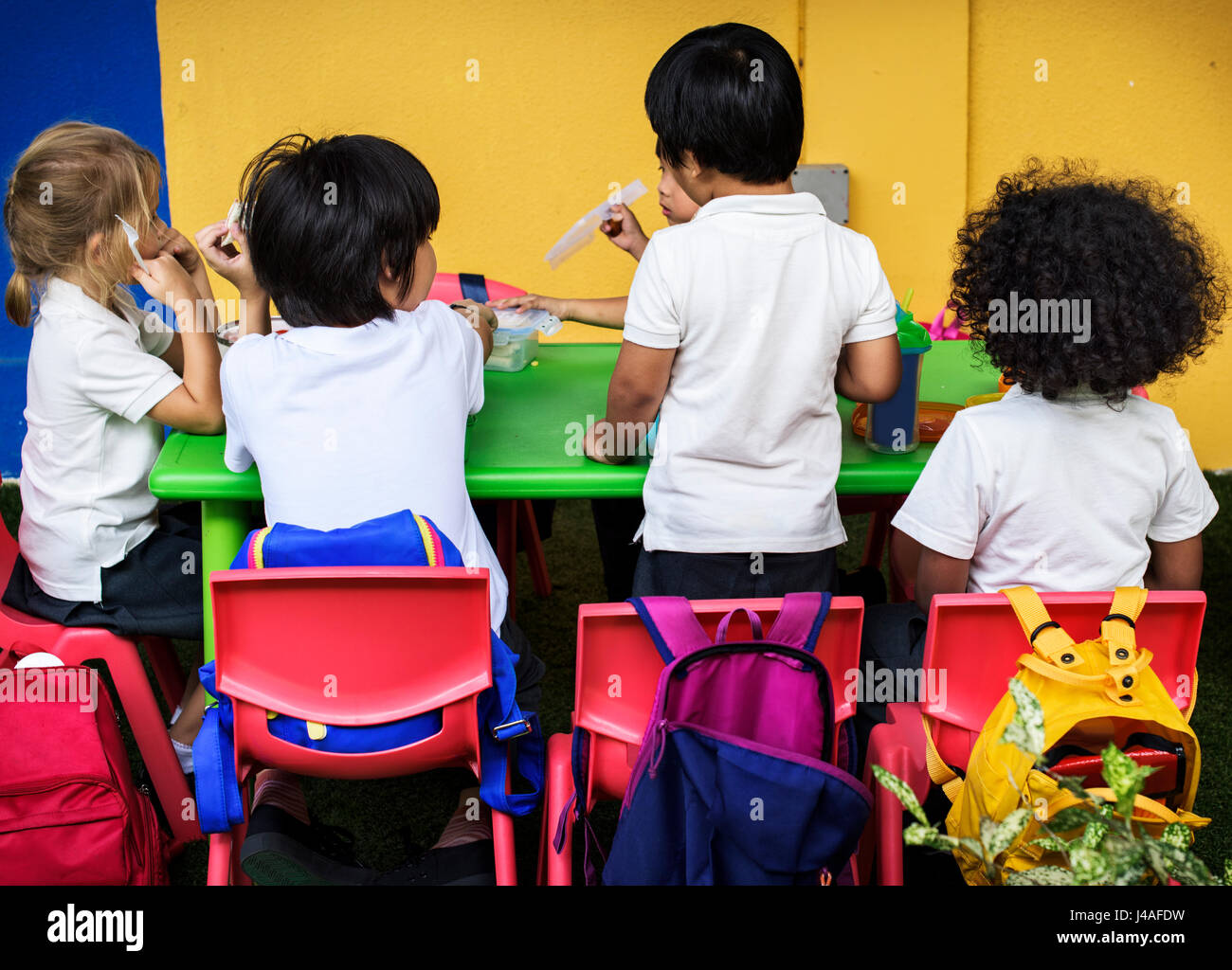 Group of Kindergarten Students Eating Food Lunch Break Together Stock ...
