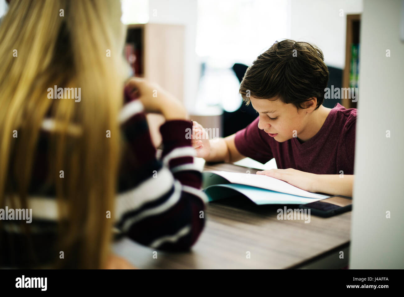 Students reading book knowledge at library Stock Photo - Alamy
