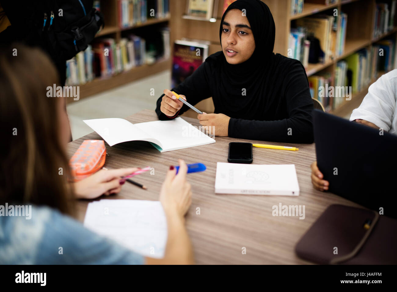Students activity in library knowledge Stock Photo - Alamy
