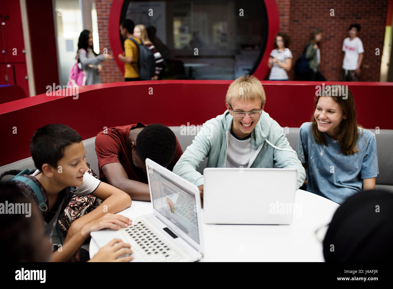 Students e-learning with laptop Stock Photo - Alamy