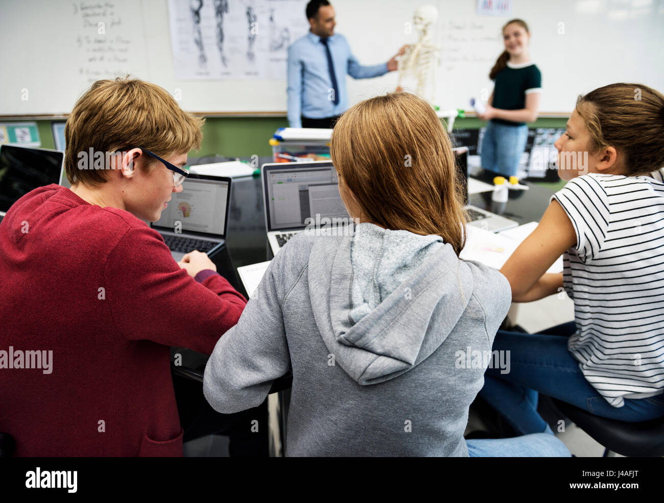 Students e-learning with laptop Stock Photo - Alamy