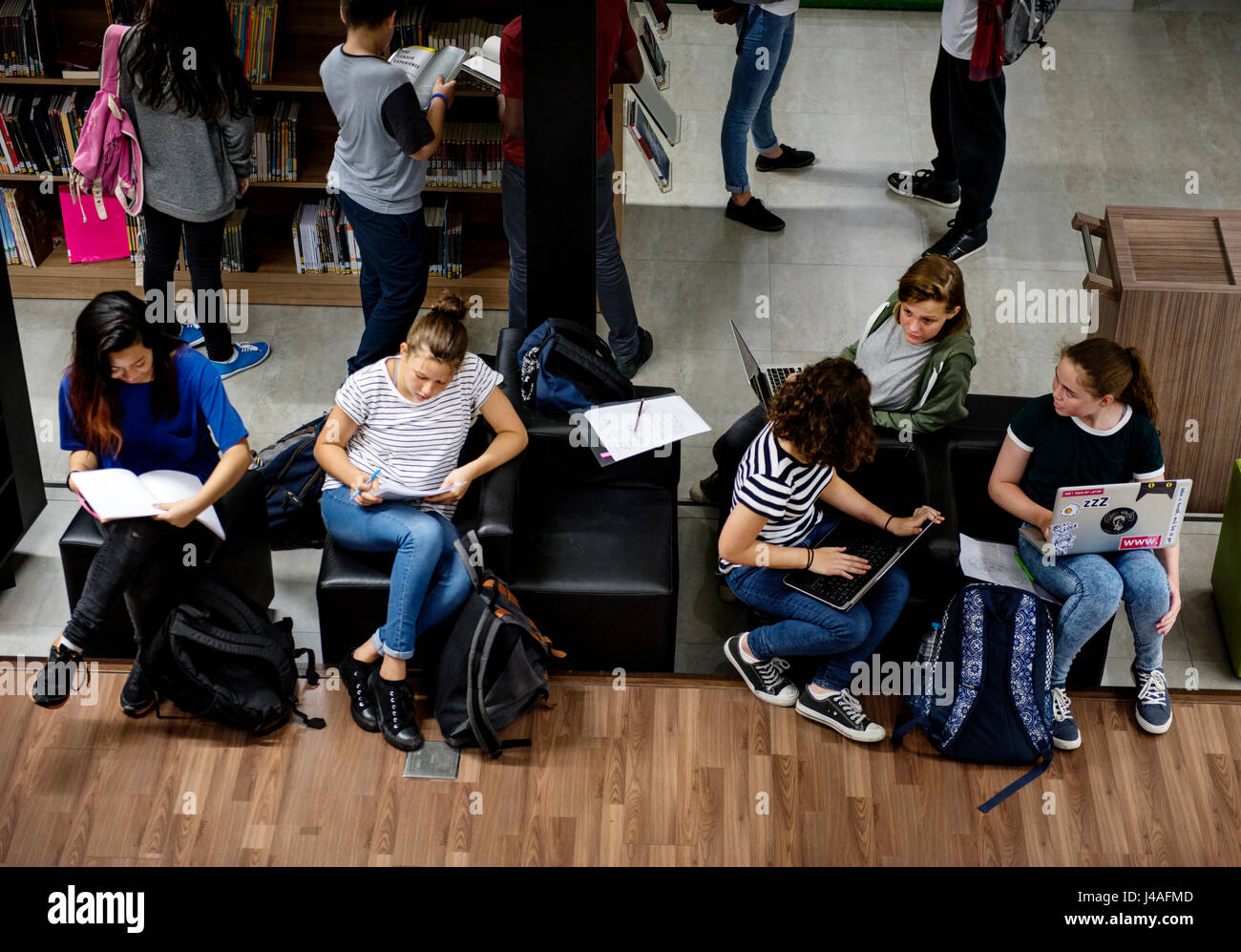 Students activity in library knowledge Stock Photo - Alamy