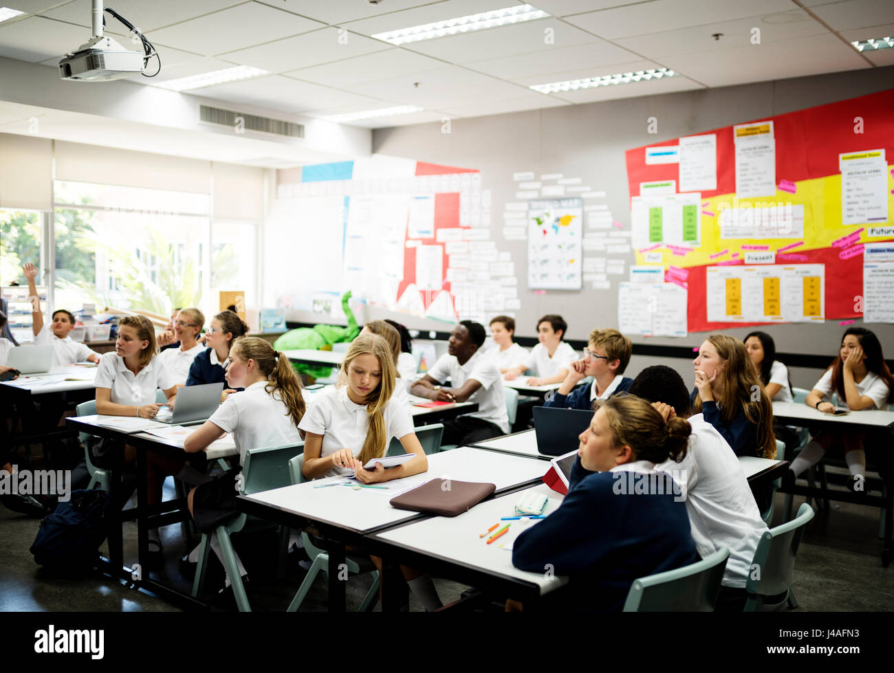 Teenage students classroom uniform hi-res stock photography and images ...