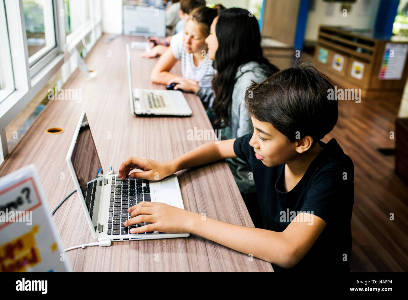 Students laptop classroom diversity hi-res stock photography and images ...