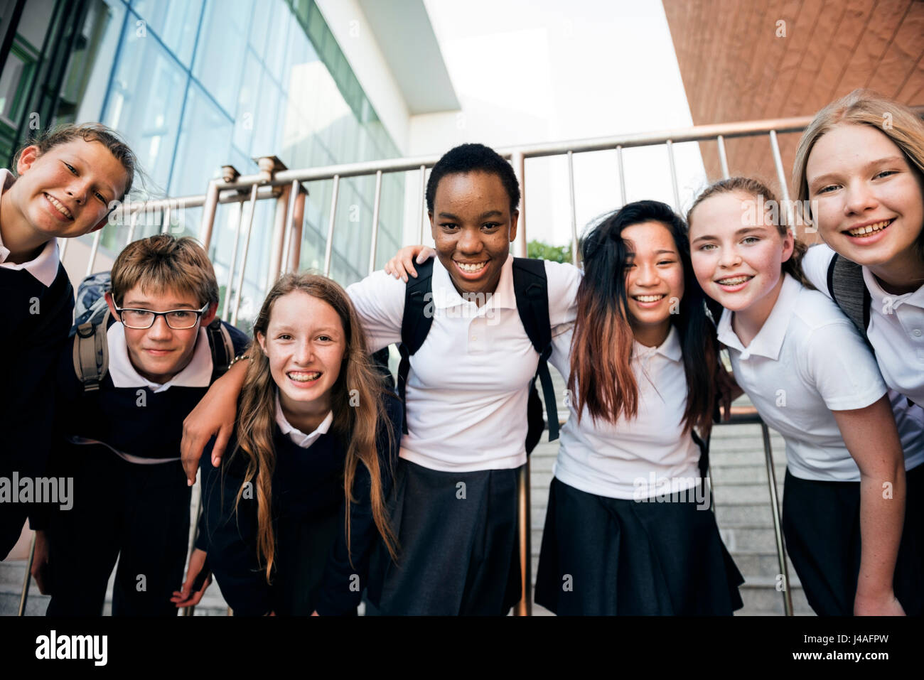 Group of students friends together smiling happiness Stock Photo - Alamy