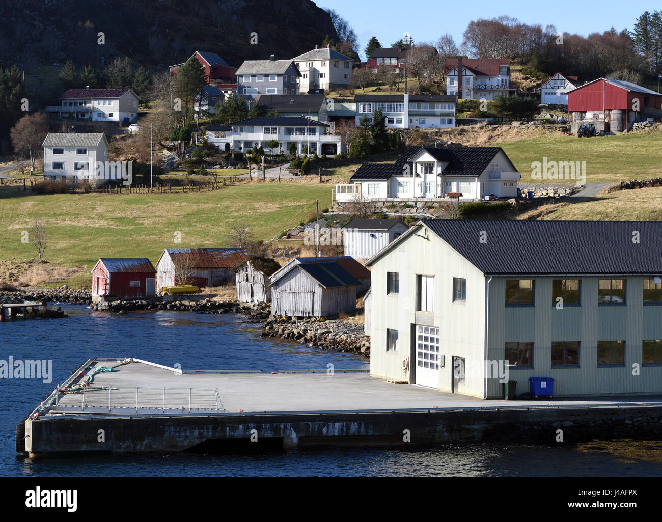 A floating wooden jetty at Torvik on the island Leinøya. Møre and ...