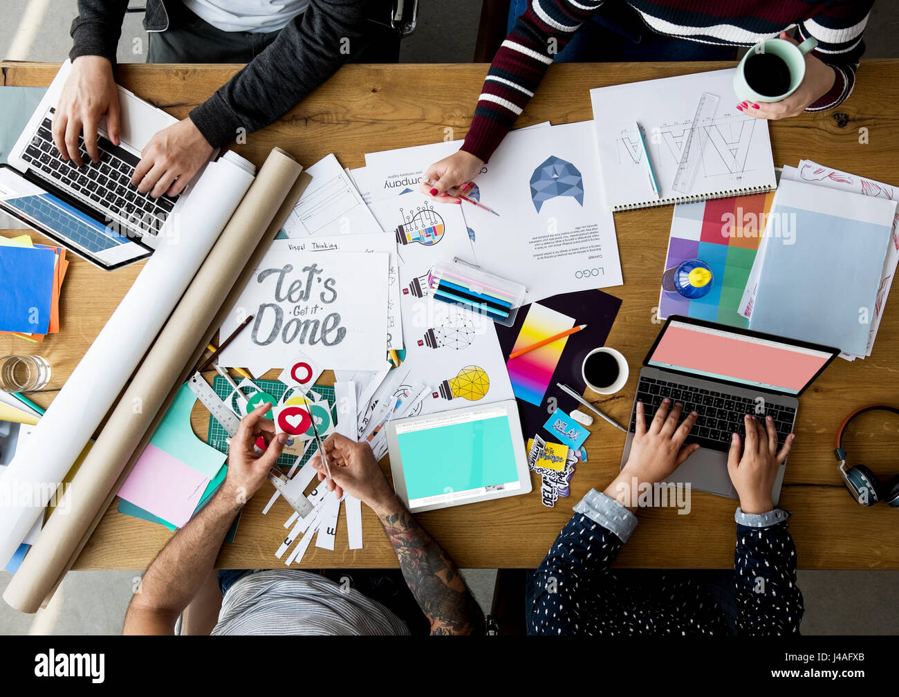 Group of colleagues people brainstorming Stock Photo - Alamy