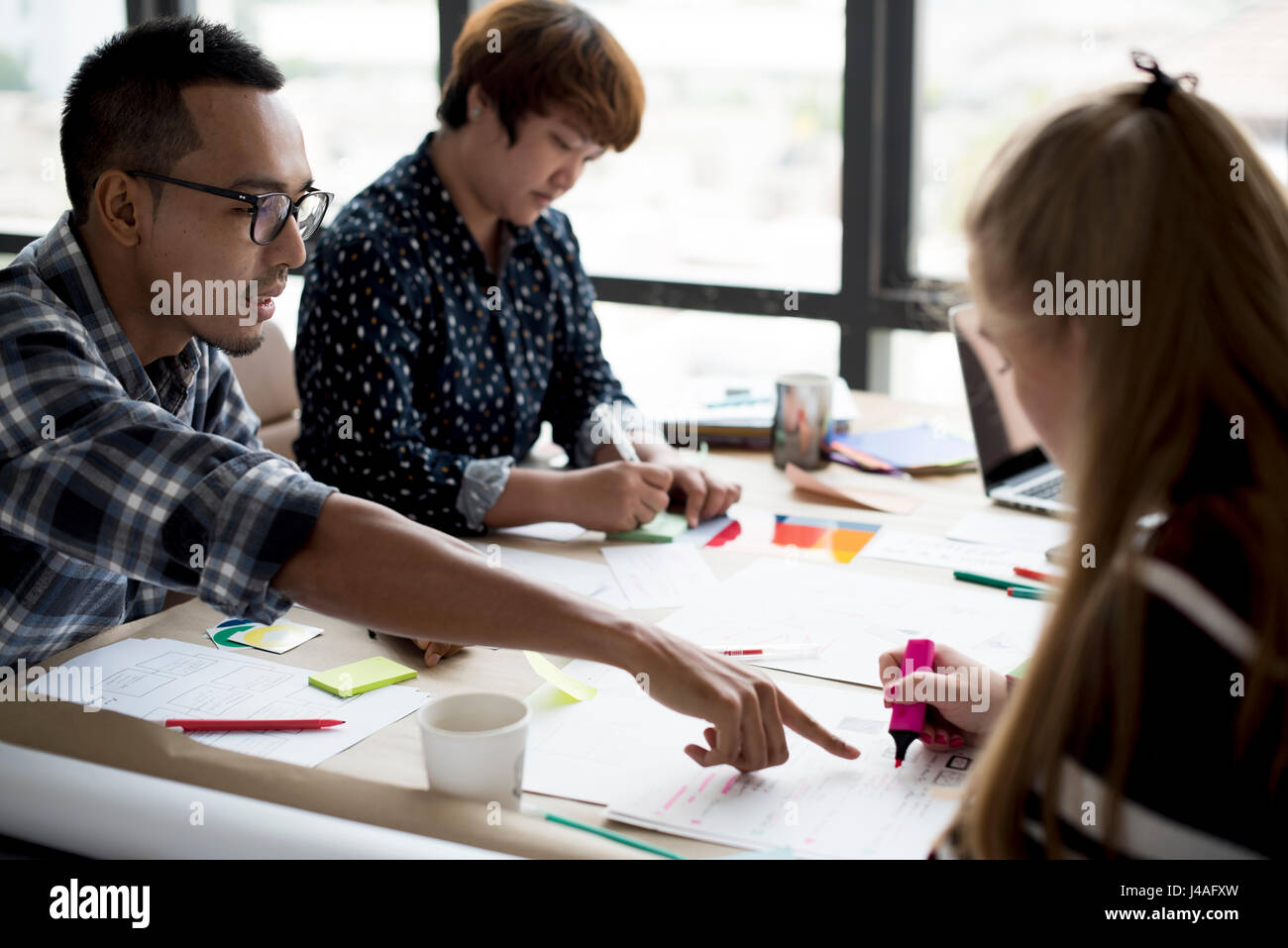 Group of colleagues people brainstorming Stock Photo - Alamy