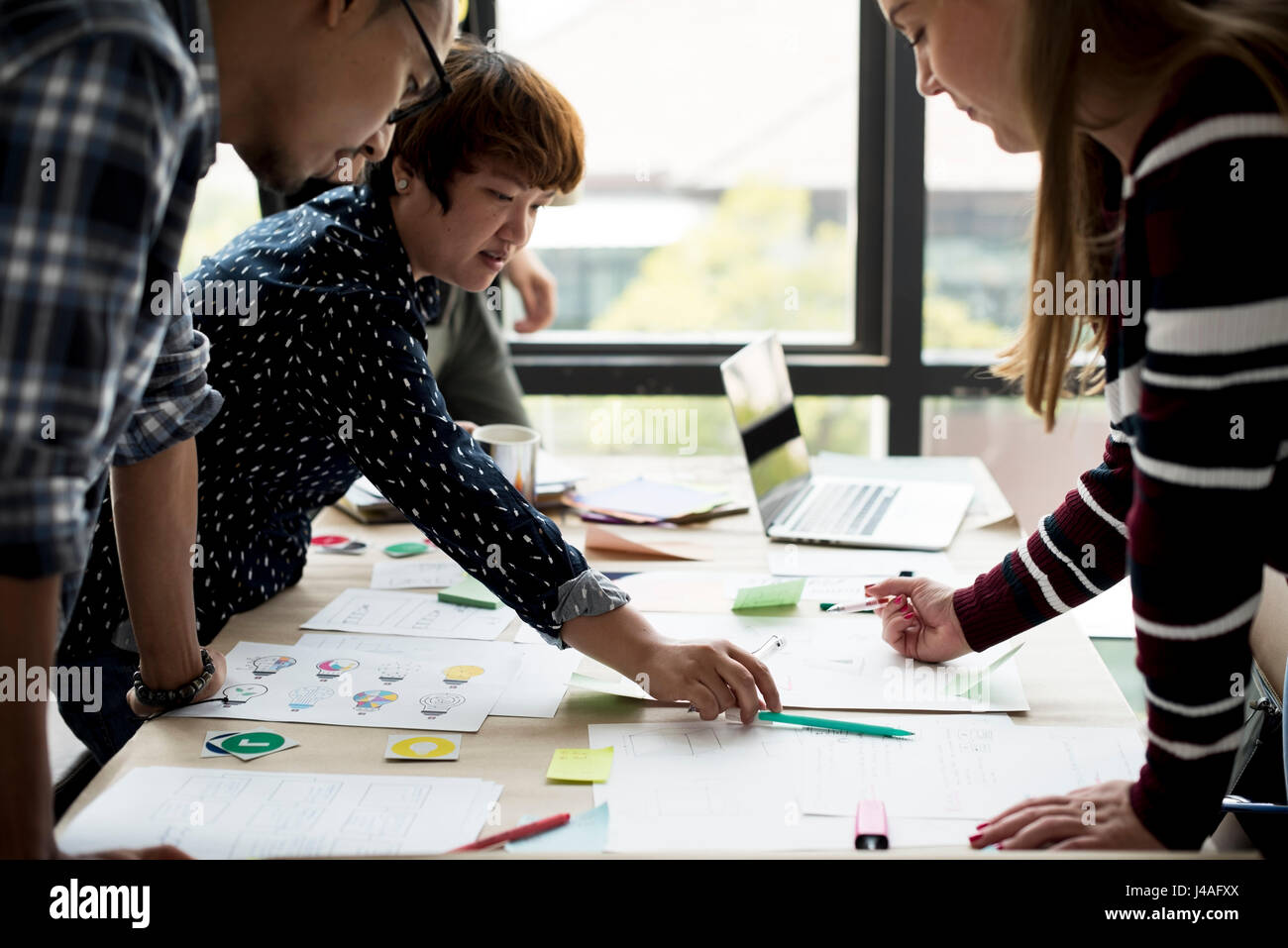Group of colleagues people brainstorming Stock Photo - Alamy
