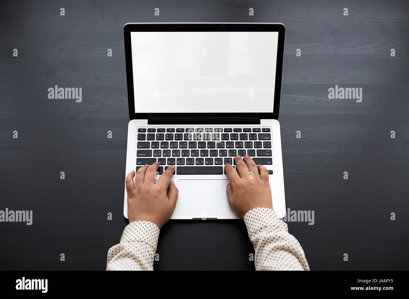 People Hands Using Laptop on Gray Table Background Stock Photo - Alamy