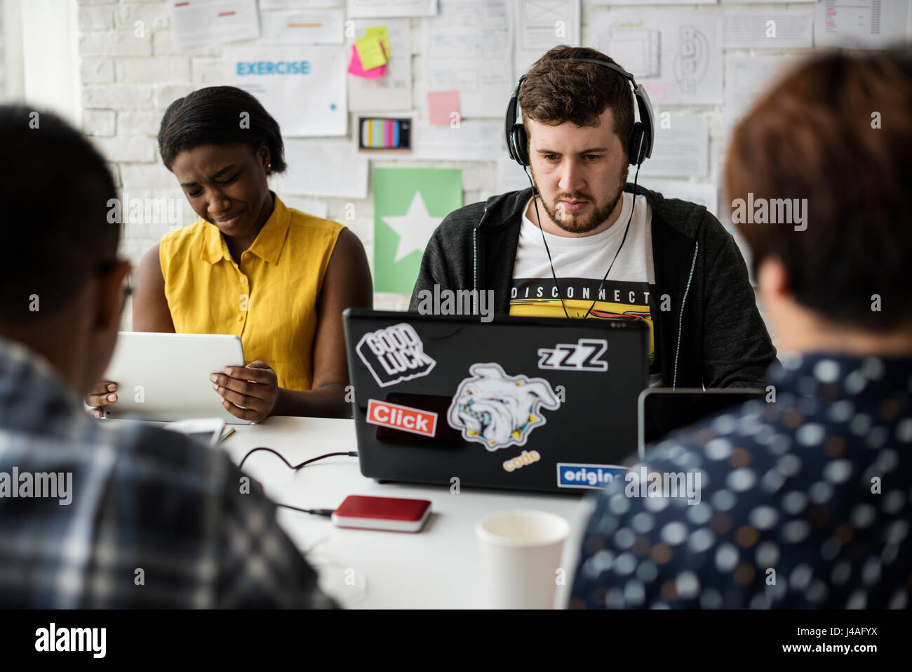 Group of colleagues people brainstorming Stock Photo - Alamy