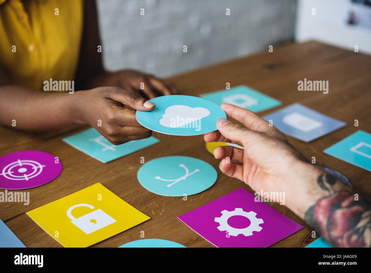Group of computer icon on the wooden table Stock Photo - Alamy