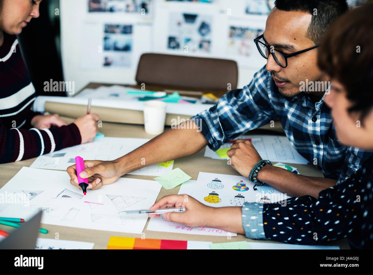 Group of colleagues people brainstorming Stock Photo - Alamy