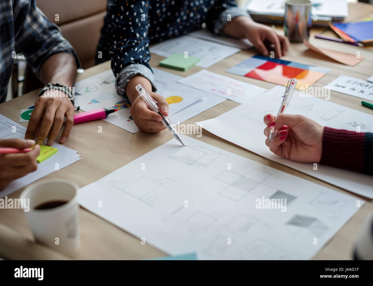 Group of colleagues people brainstorming Stock Photo - Alamy
