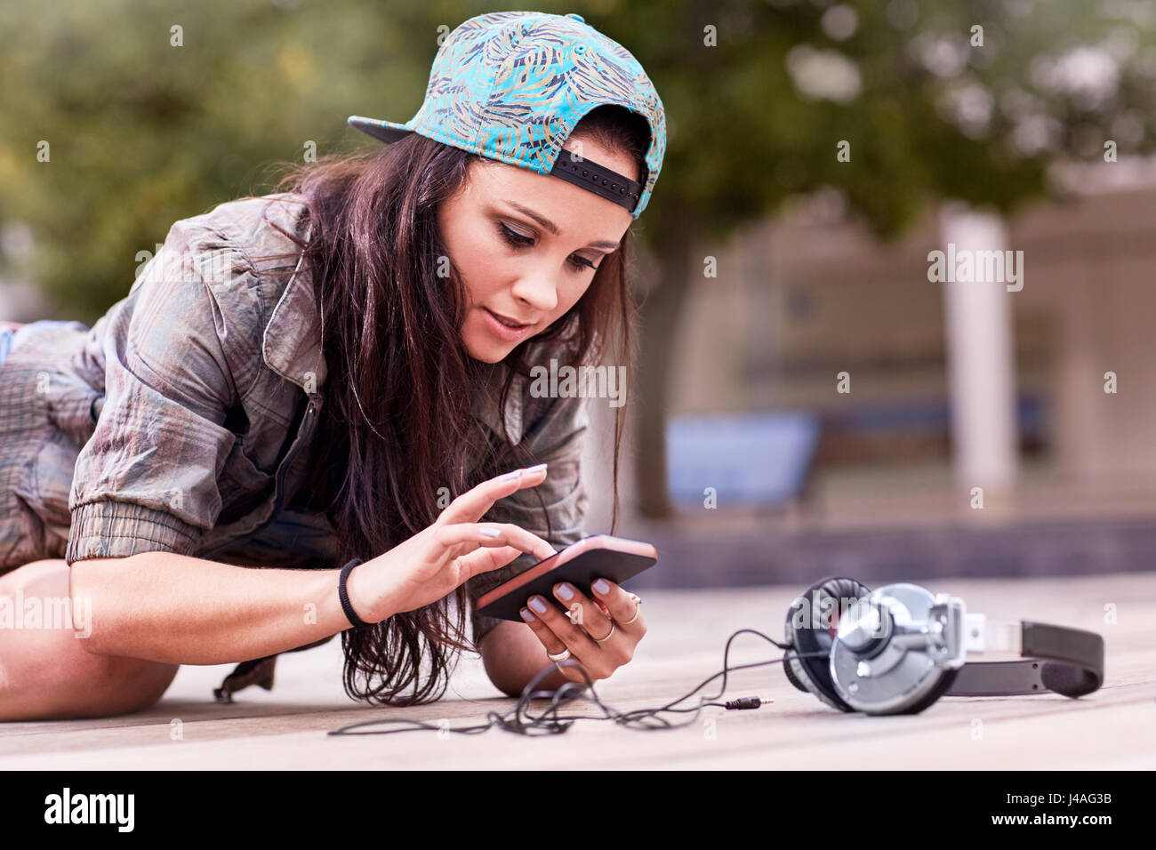 Dancer texting on mobile phone Stock Photo - Alamy