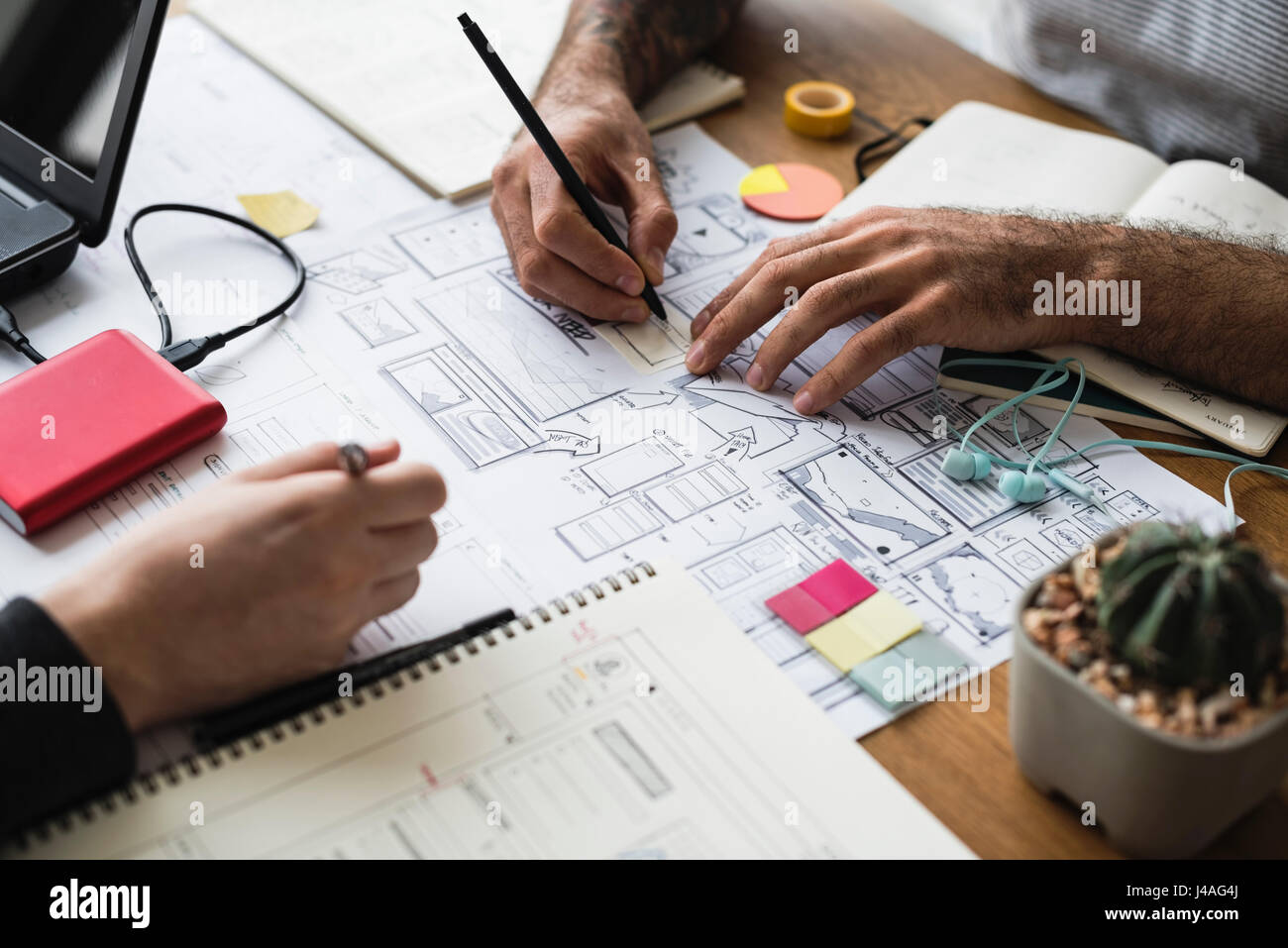 Hands Writing Drawing on Idea Paper Working Stock Photo - Alamy