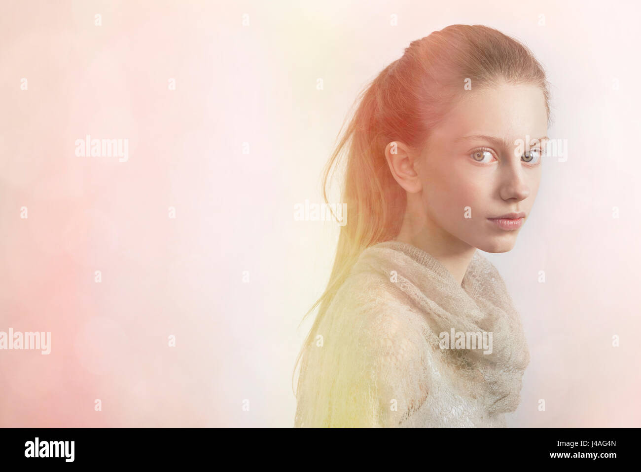 Portrait of girl against pale background Stock Photo - Alamy