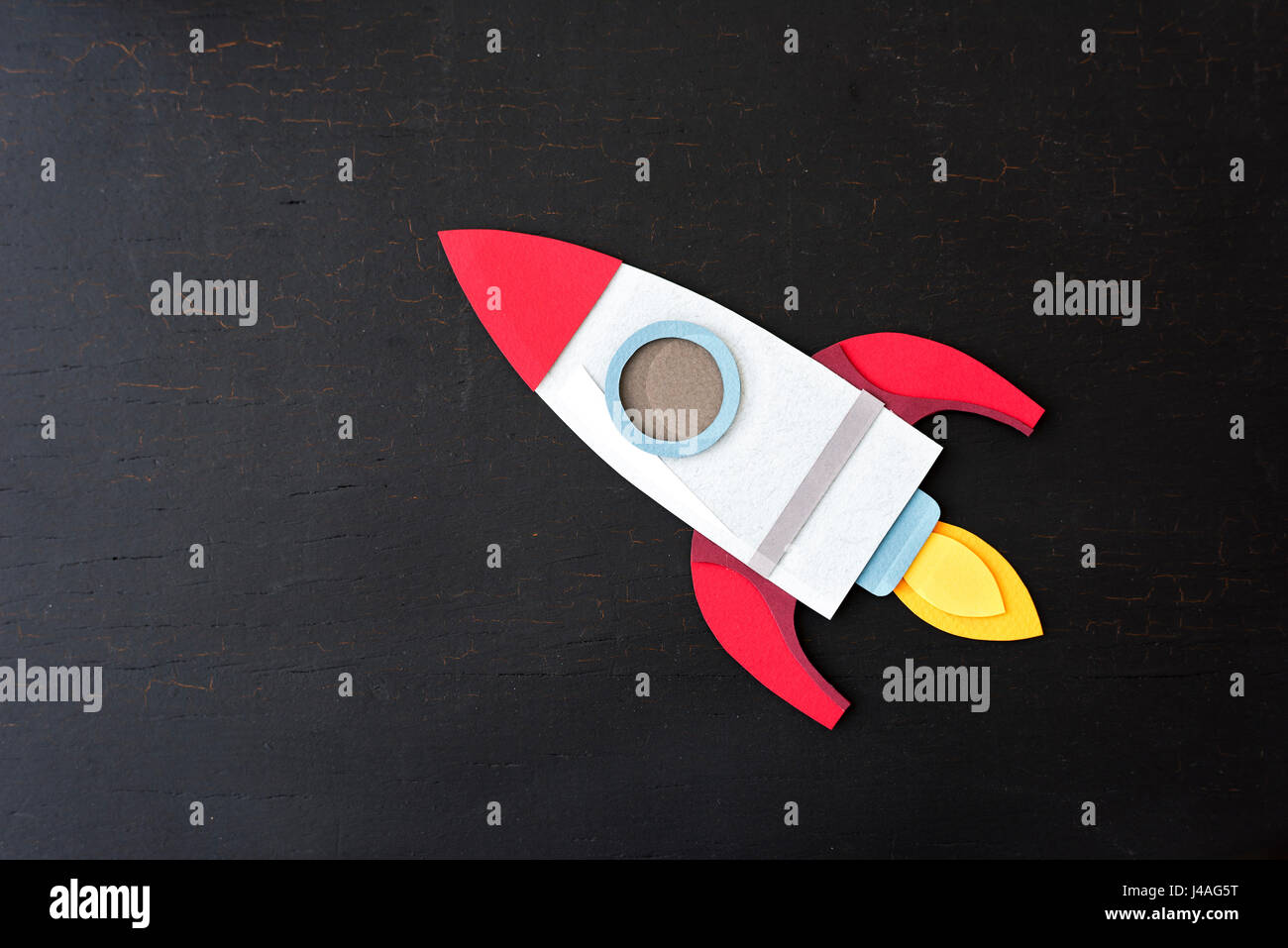 Rocket Spaceship Paper Craft Launch on Black Background Stock Photo - Alamy